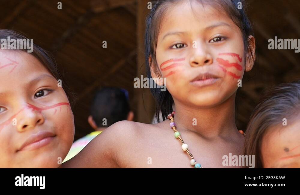 Cute native Brazilians having fun at an indigenous tribe in the Amazon ...