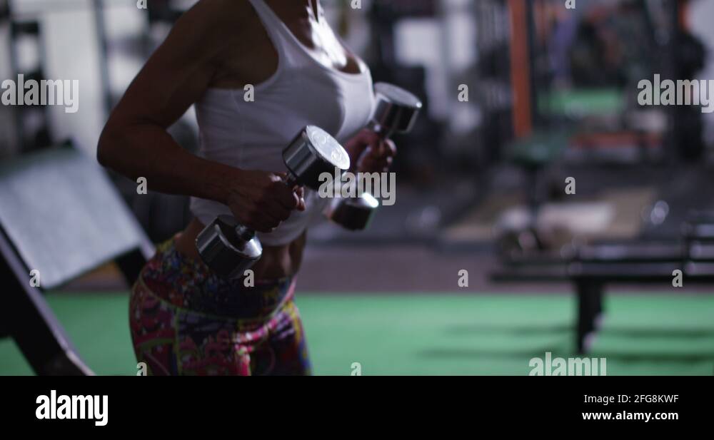 Female body builder lifting weights Stock Videos & Footage - HD and 4K ...