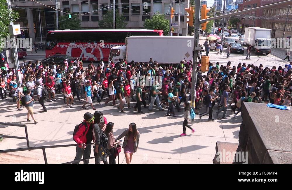 Crowds of diverse college and university students on campus in Toronto ...