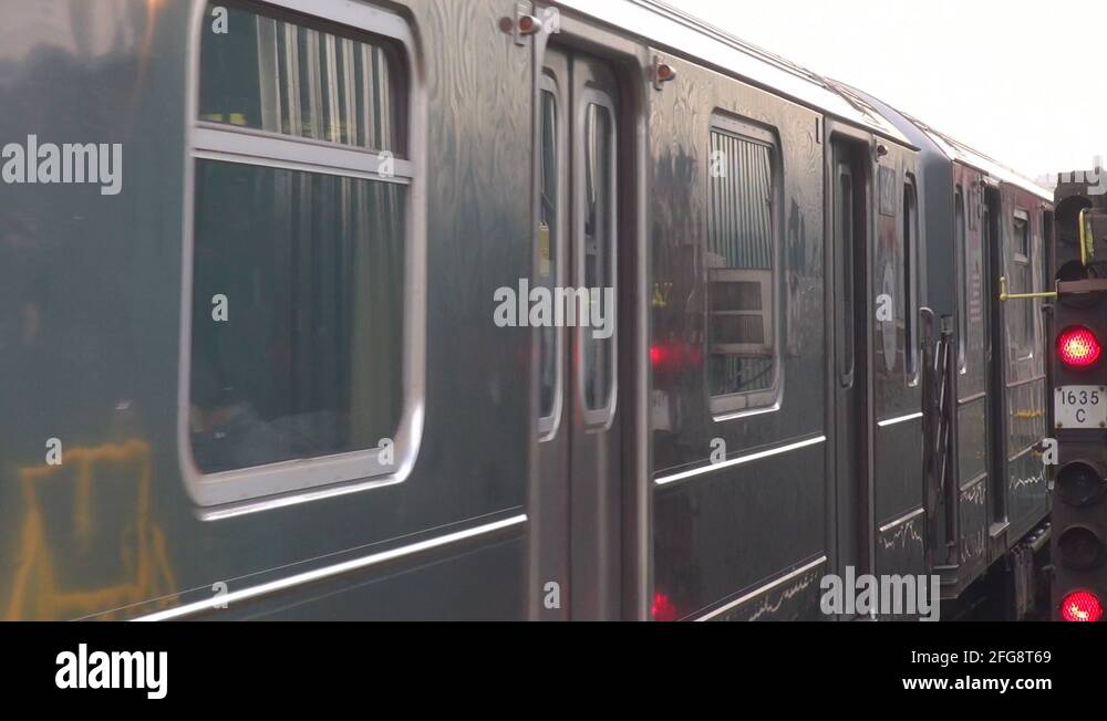 Famous subway train arrive station New York City metro line suburb ...