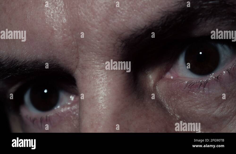 Mad insane crazy evil man's eyes close up Stock Video Footage - Alamy