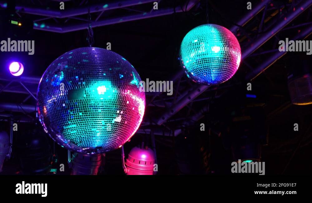 Spinning disco ball in night club 4k Stock Video Footage - Alamy