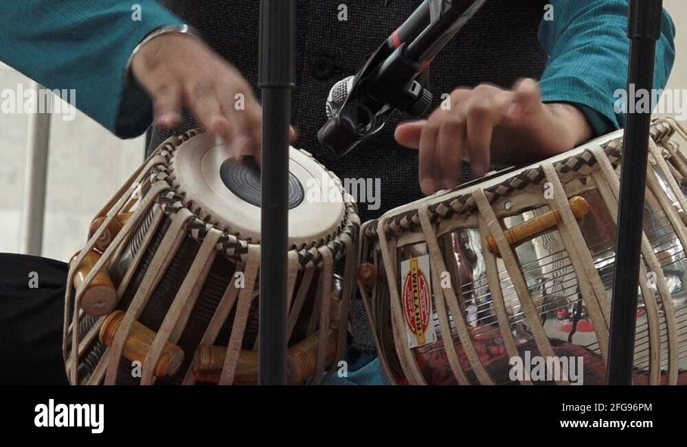 Indian man playing Indian musical instrument Tabla Stock Video Footage ...