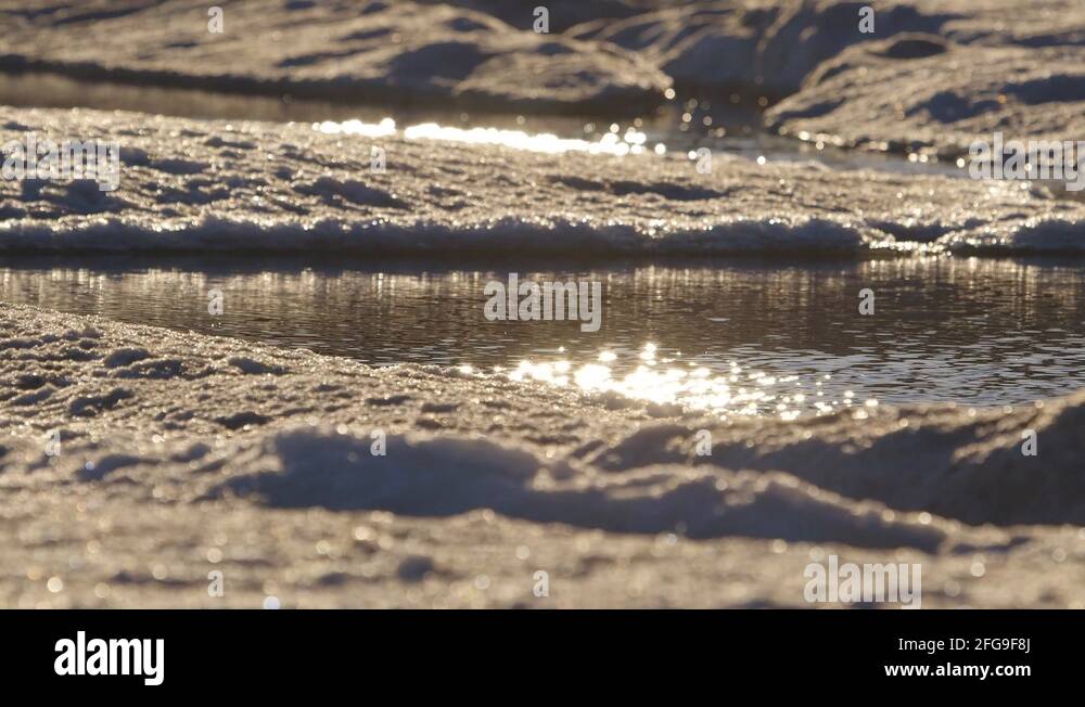 Melt pond formed on sea-ice in Arctic Bay Stock Video Footage - Alamy