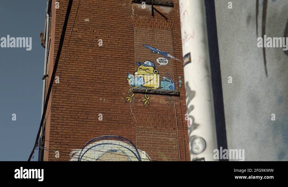 Beautiful graffiti art covered buildings in the city. 4K UHD Stock ...