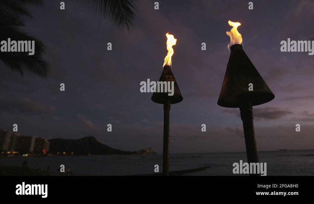 Torches with fire flames on Waikiki beach Hawaii Stock Video Footage ...