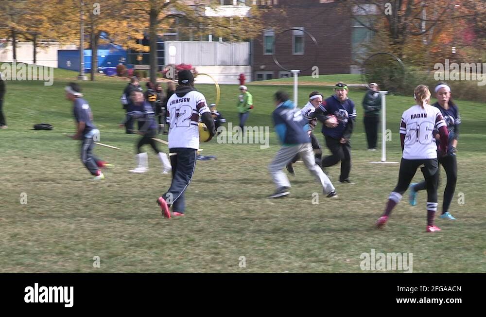 College and university students playing Quidditch on campus in the fall ...