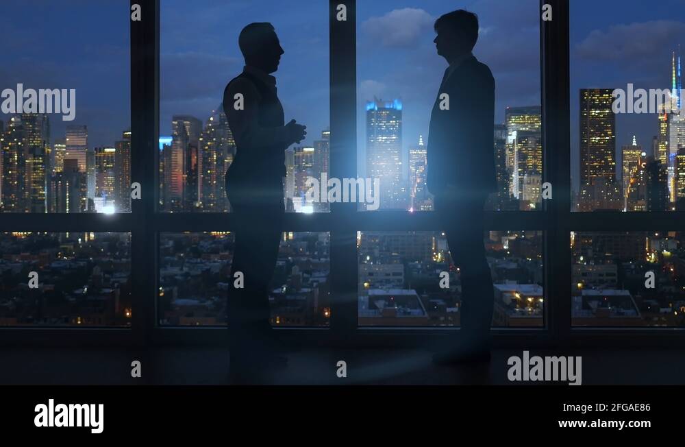 business people in high rise office building. city skyline window view ...