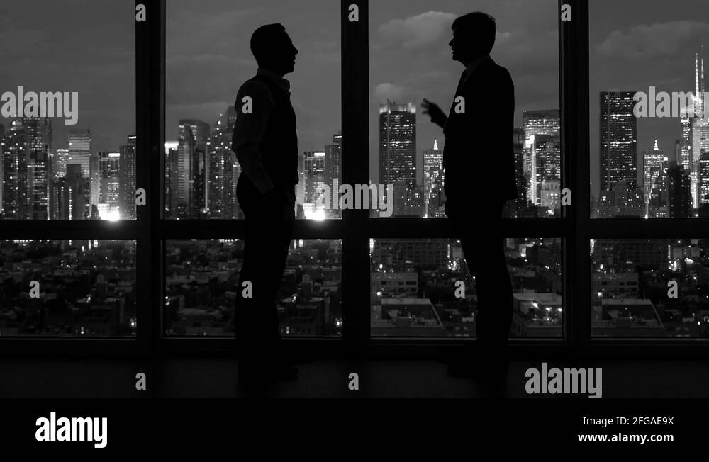 business people in high rise office building. city skyline window view ...