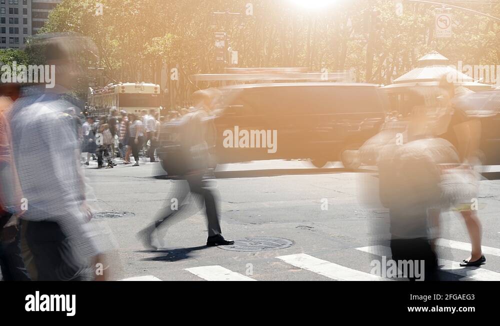 people walking on crowded street in the city. pedestrians commuters ...