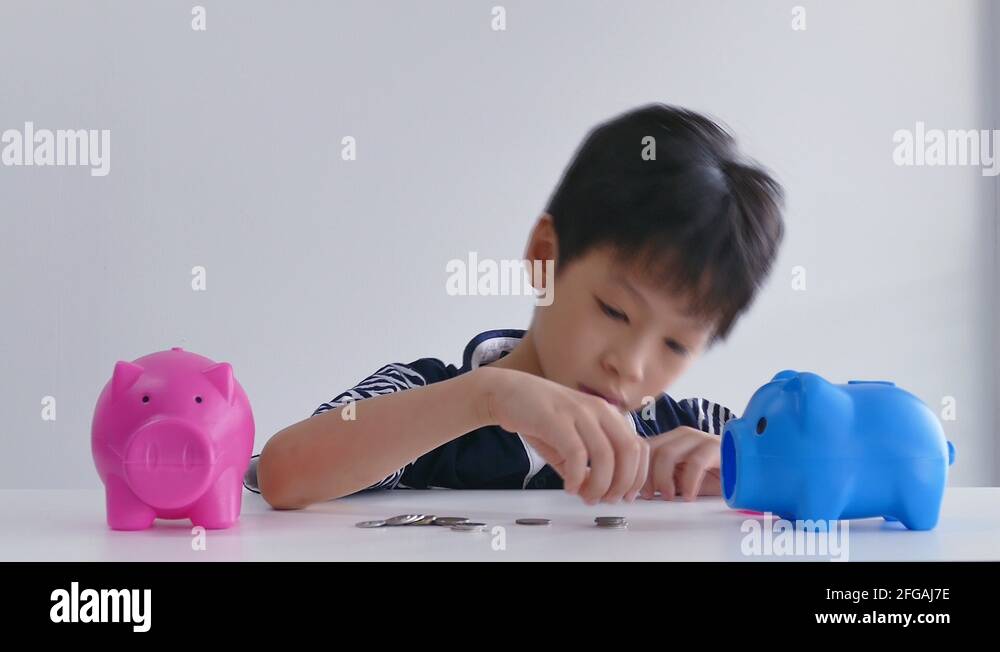 Boy counting coins Stock Videos & Footage - HD and 4K Video Clips - Alamy
