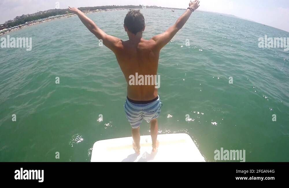 Boy jumping boat Stock Videos & Footage - HD and 4K Video Clips - Alamy