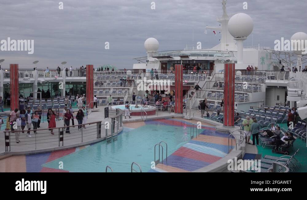 Cruise ship fun passenger by pool line dance 4K Stock Video Footage - Alamy