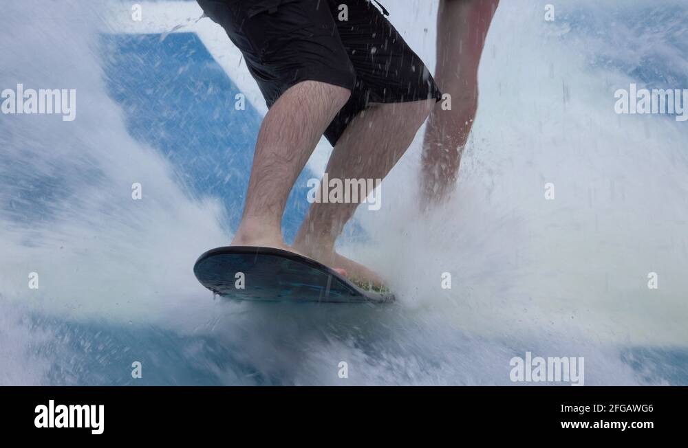 Cruise Ship recreation surfing in wave pool 4K Stock Video Footage - Alamy