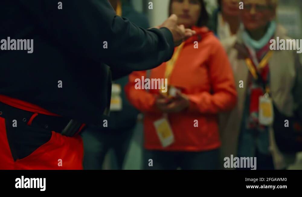 A guide is explaining something Stock Video Footage - Alamy
