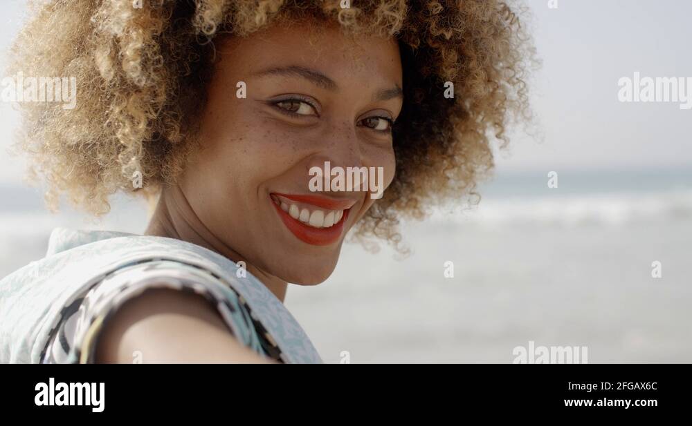 Smiling into camera Stock Videos & Footage - HD and 4K Video Clips - Alamy