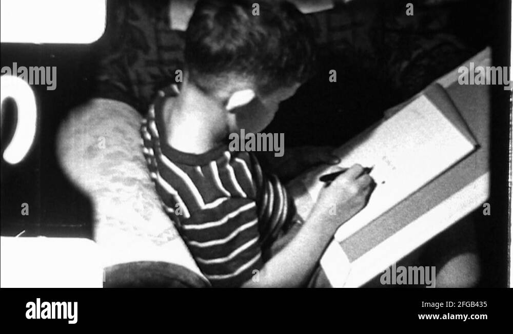 1940s Kid Boy Doing Homework Studying After School Vintage Old Film ...
