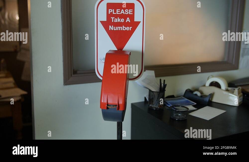 Take number ticket dispenser machine Stock Videos & Footage - HD and 4K ...