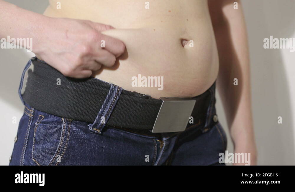 Women body fat belly front view Stock Video Footage - Alamy