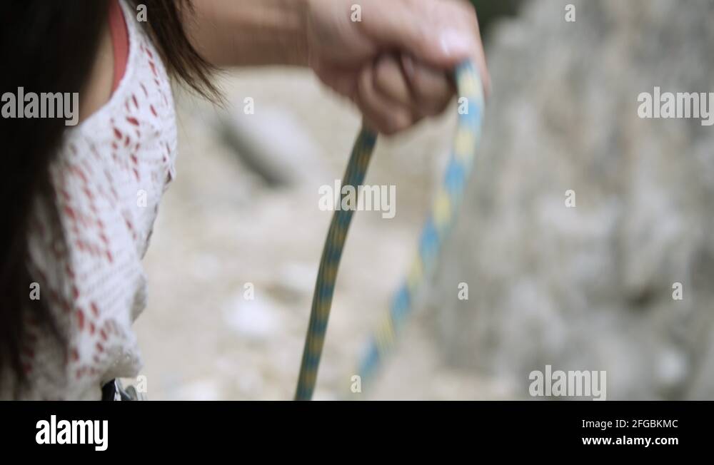 Woman tying rope Stock Videos & Footage - HD and 4K Video Clips - Alamy