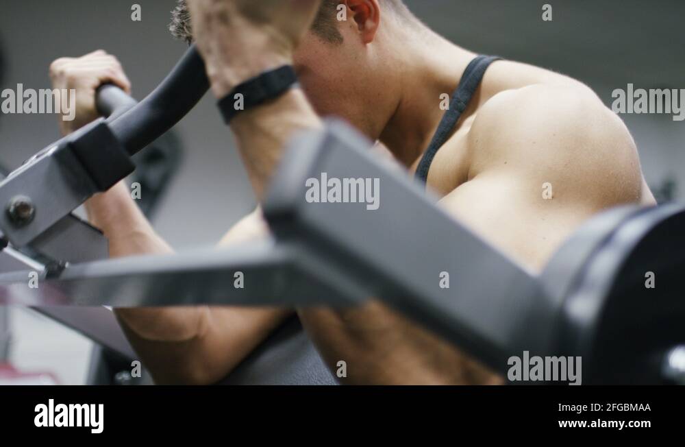 Bicep curl machine Stock Videos & Footage - HD and 4K Video Clips - Alamy