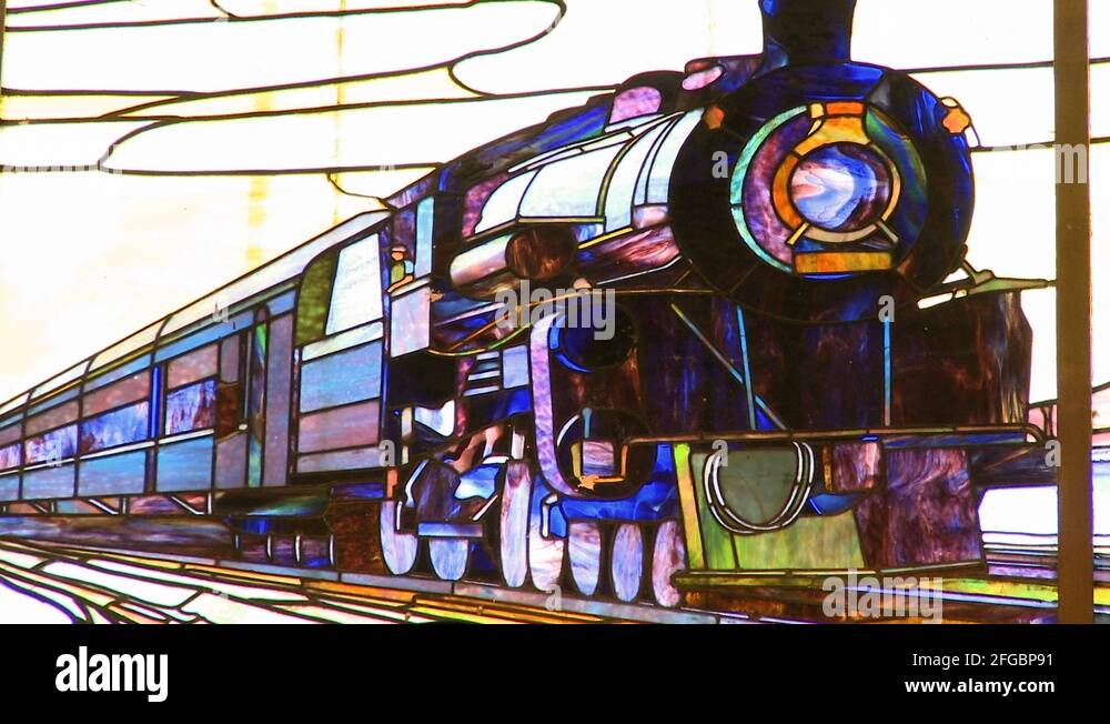 Stained glass window of a locomotive train Stock Video Footage - Alamy