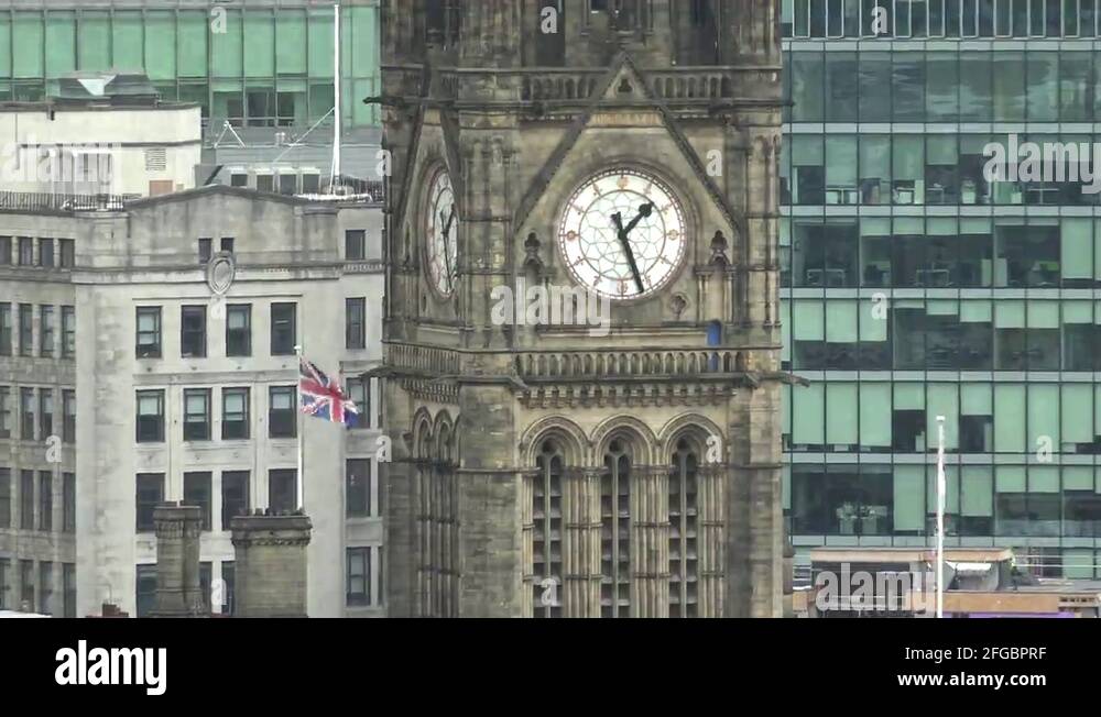 4K Timelapse public clock downtown tower Manchester architecture ...