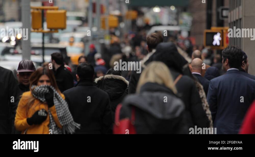 Crowd of commuter people walking on street in New York City Stock Video ...