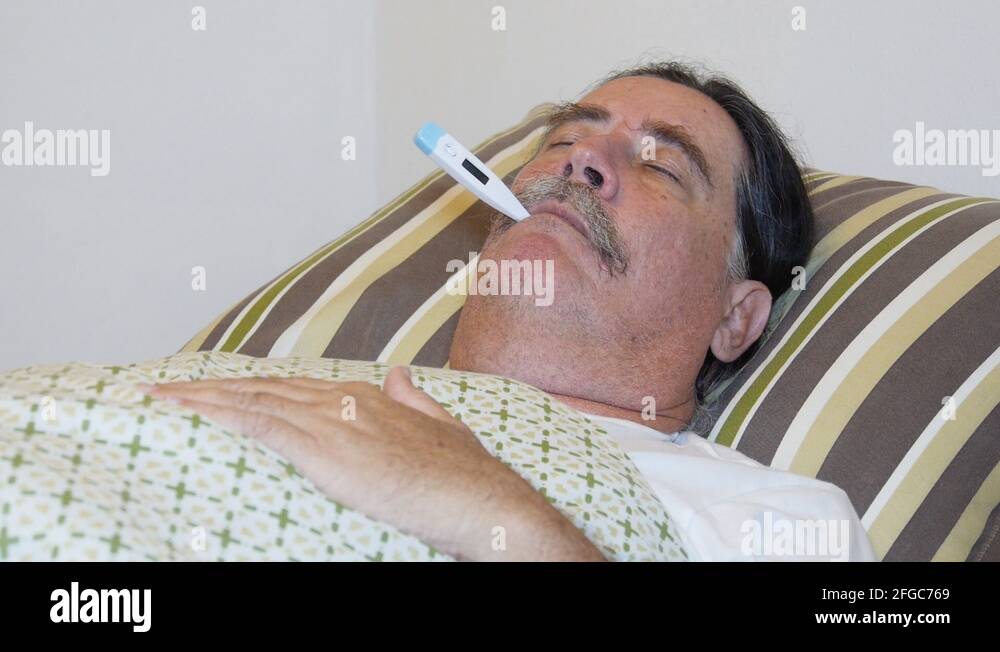 Fever man thermometer Stock Videos & Footage - HD and 4K Video Clips ...