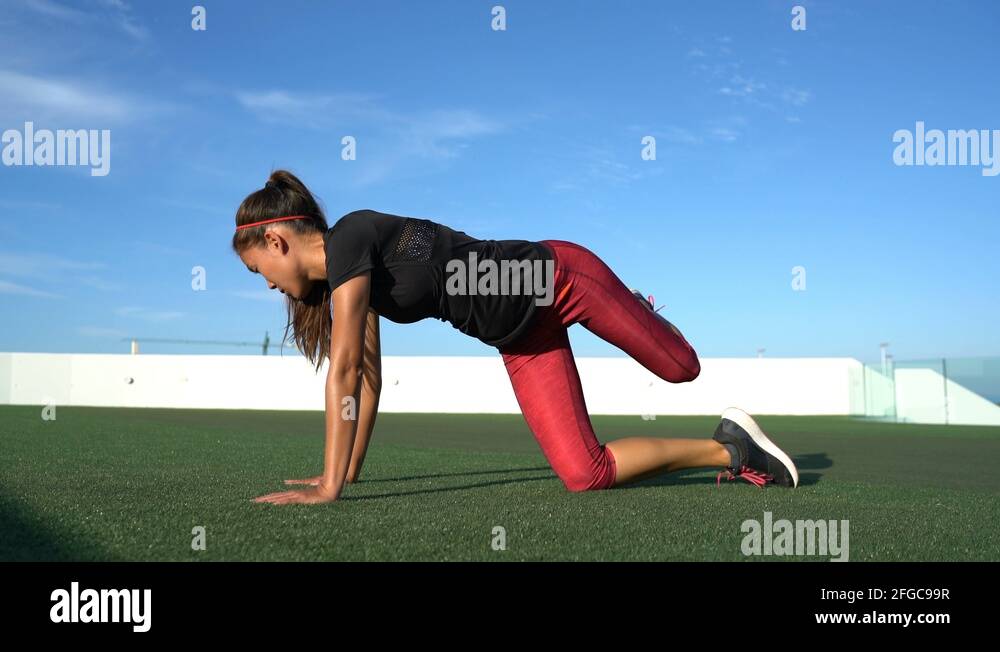 Bodyweight workout fitness woman doing fire hydrant and glute kickback ...