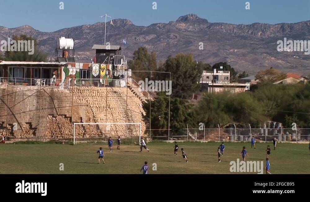 Greek Cypriot army bunker above soccer field, Cyprus Green Line Stock ...