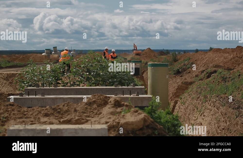 Excavator digging and moving earth at construction site Stock Video ...