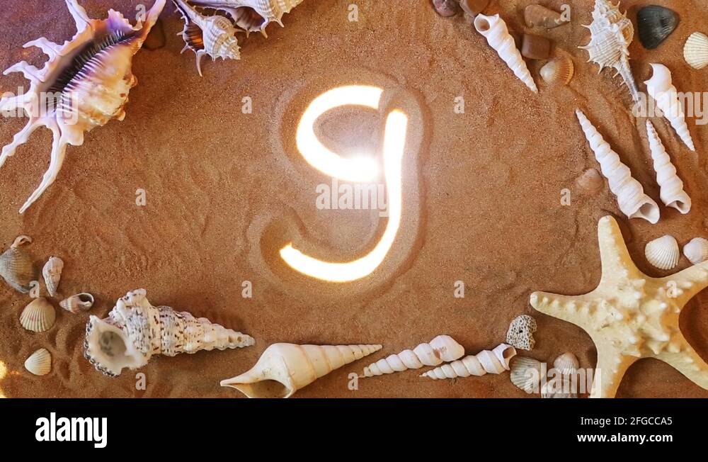 Hand drawing Number Nine 9 symbol in the sand. Beach background. Top ...