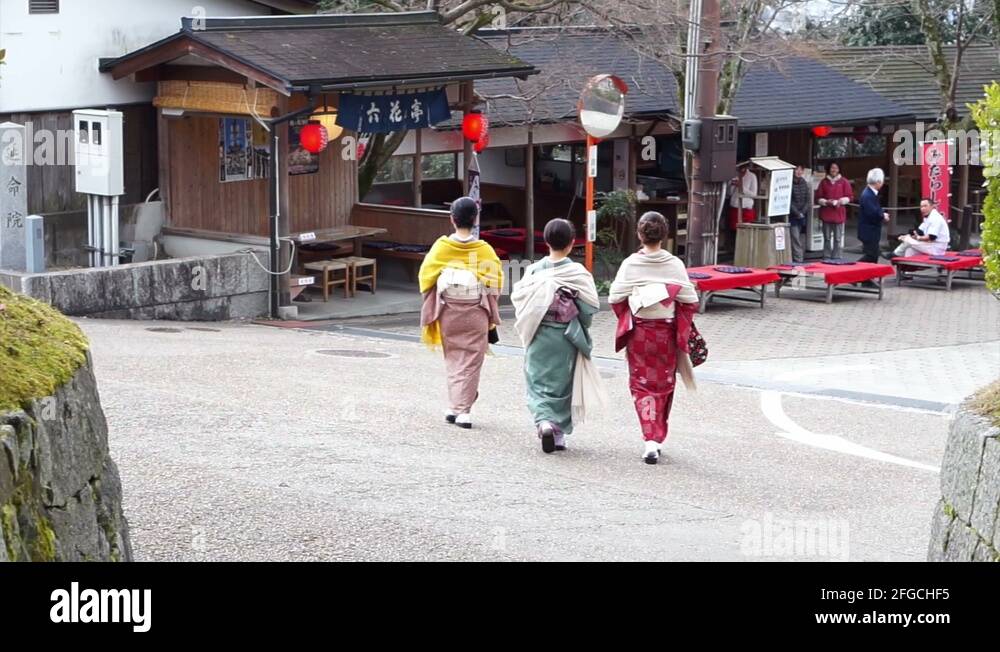 Japanese Girls Wear Kimono Parasol And Geta Japan Sandal Footwear Stock