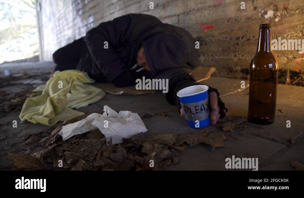 A homeless man sleeping in a tunnel Stock Video Footage - Alamy