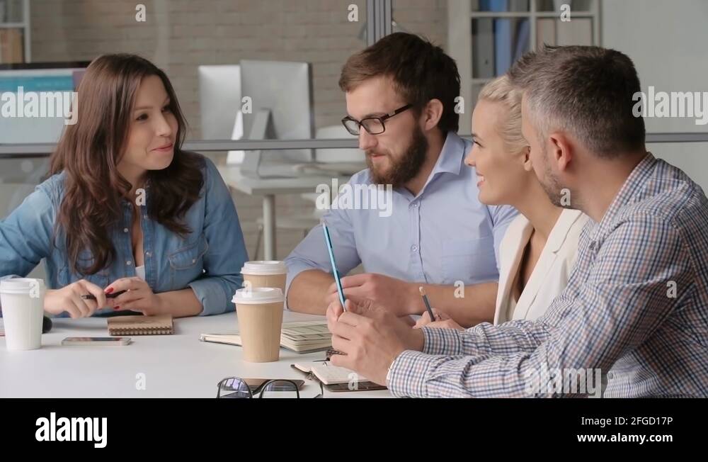 Sharing colleagues Stock Videos & Footage - HD and 4K Video Clips - Alamy