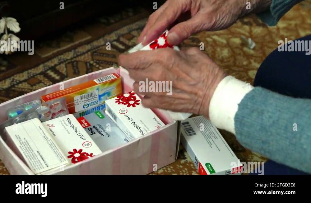 4K Old Woman Looking in her Medication Box Stock Video Footage - Alamy