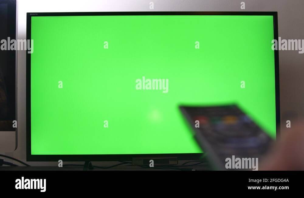 Right Handed Man Changing Channel On His Green Screen TV Stock Video ...