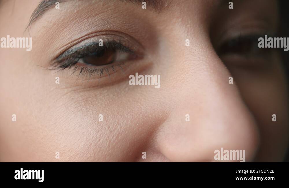 Detail of woman's eyes looking around and blinking Stock Video Footage ...