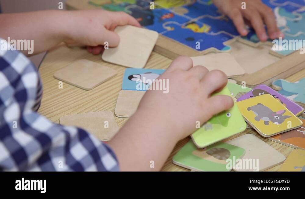 Kids playing puzzle Stock Videos & Footage - HD and 4K Video Clips - Alamy