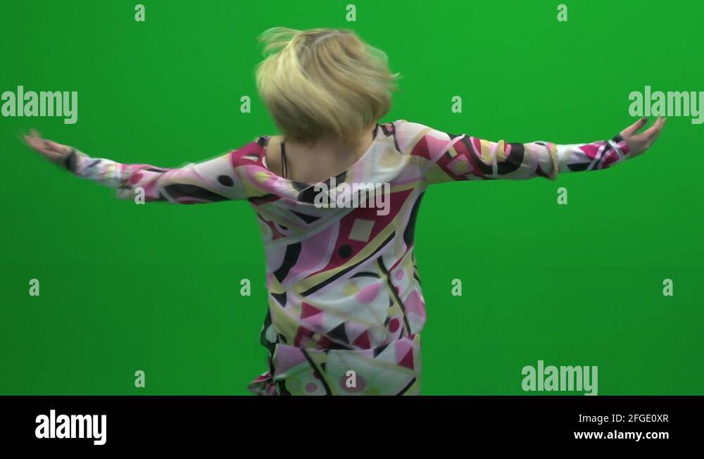 women turning around against green screen Stock Video Footage - Alamy