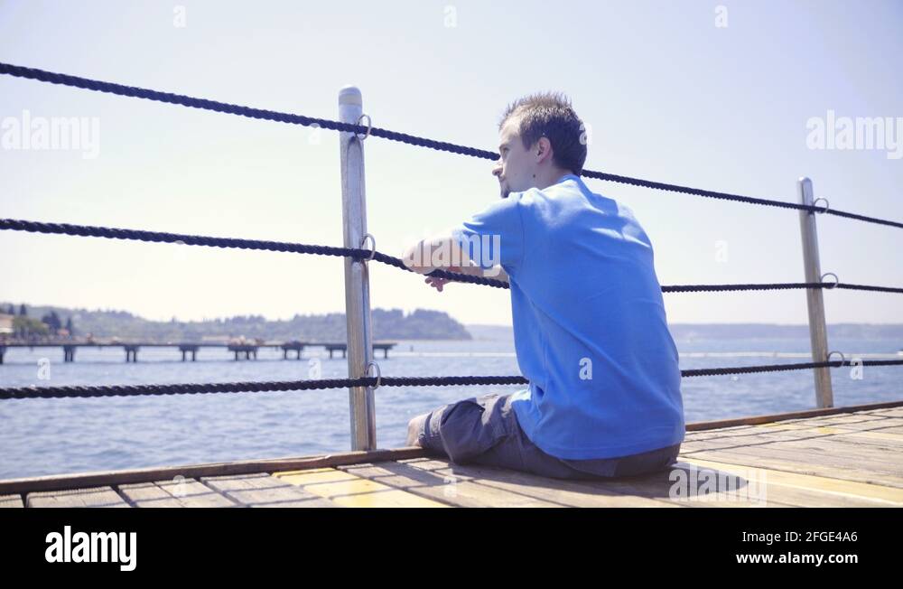 Sunbathing sitting sea Stock Videos & Footage - HD and 4K Video Clips ...