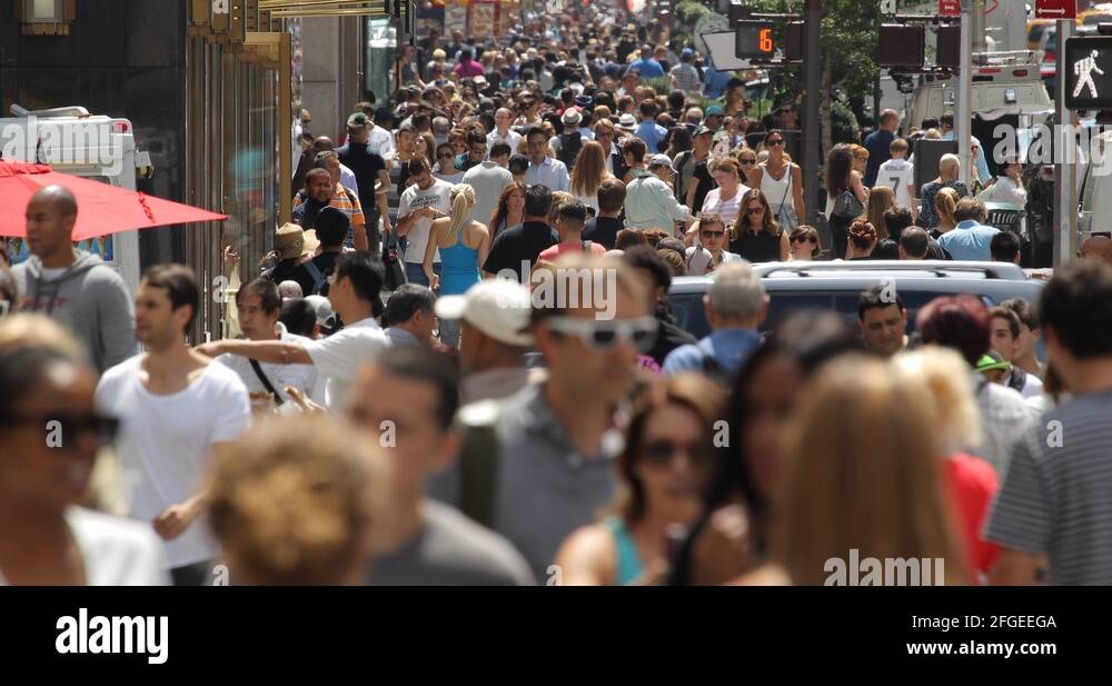 Crowd of commuter people walking street sidewalk Stock Video Footage ...
