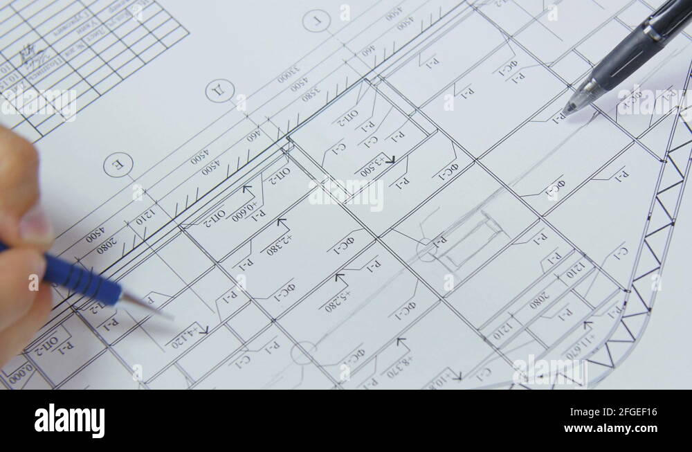architect hand with pencil drawing into blueprints Stock Video Footage ...
