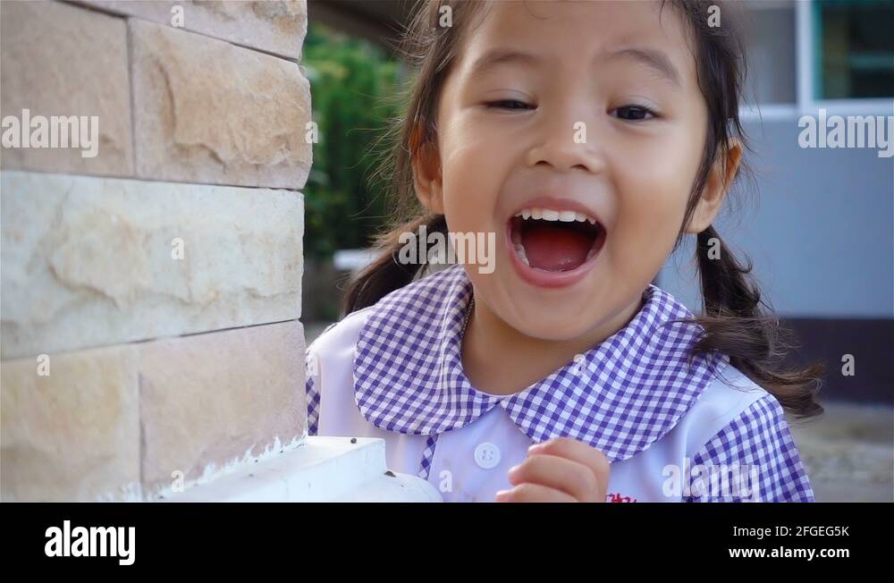 Slow motion of little girl acting very surprised Stock Video Footage ...