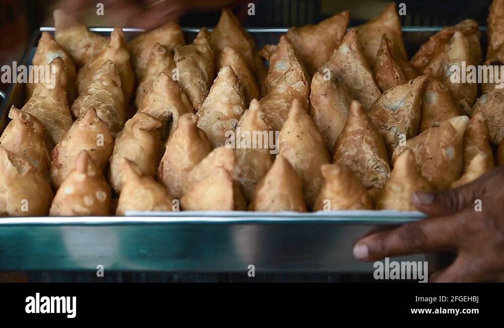 Samosa tray Stock Videos & Footage - HD and 4K Video Clips - Alamy