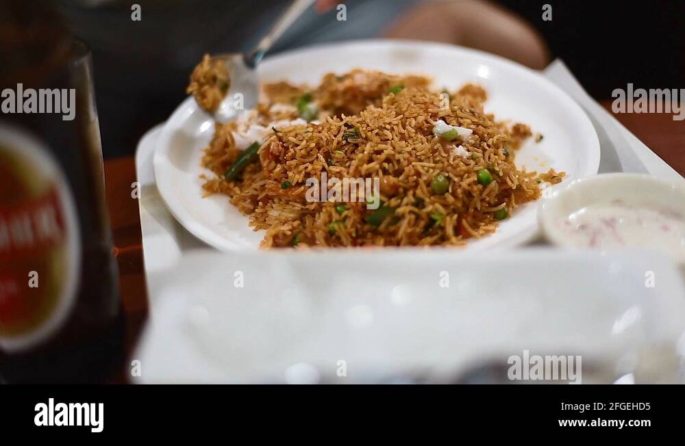 Indian biryani Stock Videos & Footage - HD and 4K Video Clips - Alamy