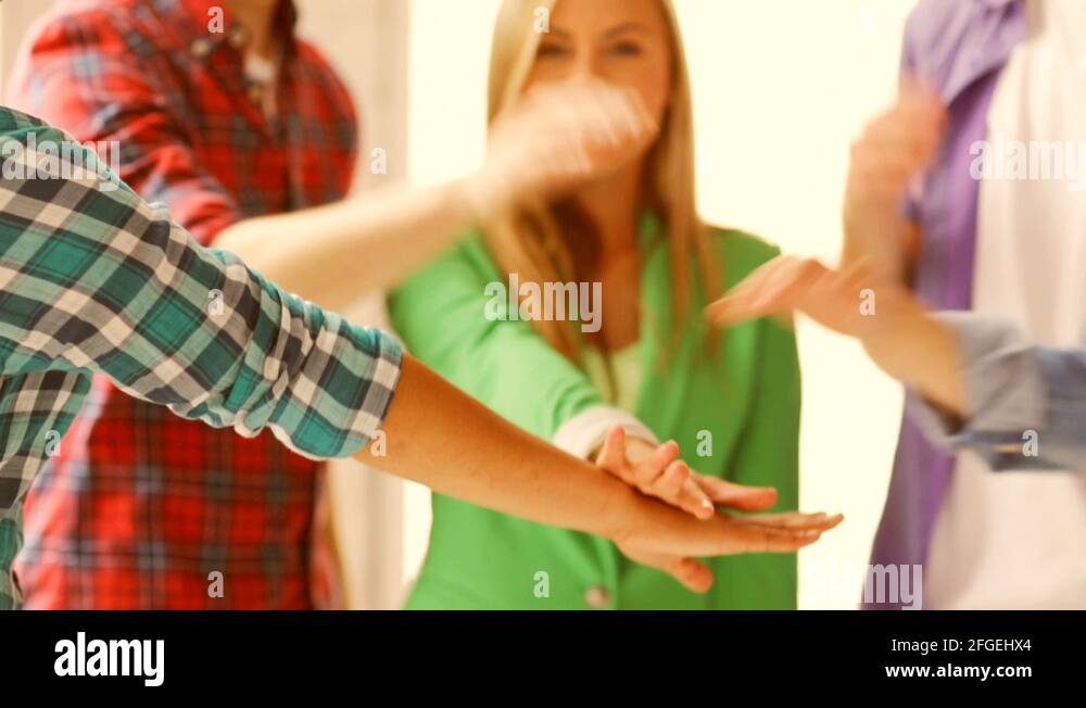 students in school showing unity with their hands together Stock Video ...