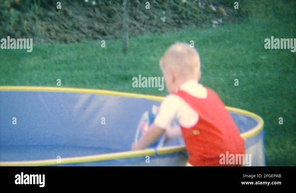 Kids Play With Boat In Kiddie Pool-1967 Vintage 8mm film Stock Video ...