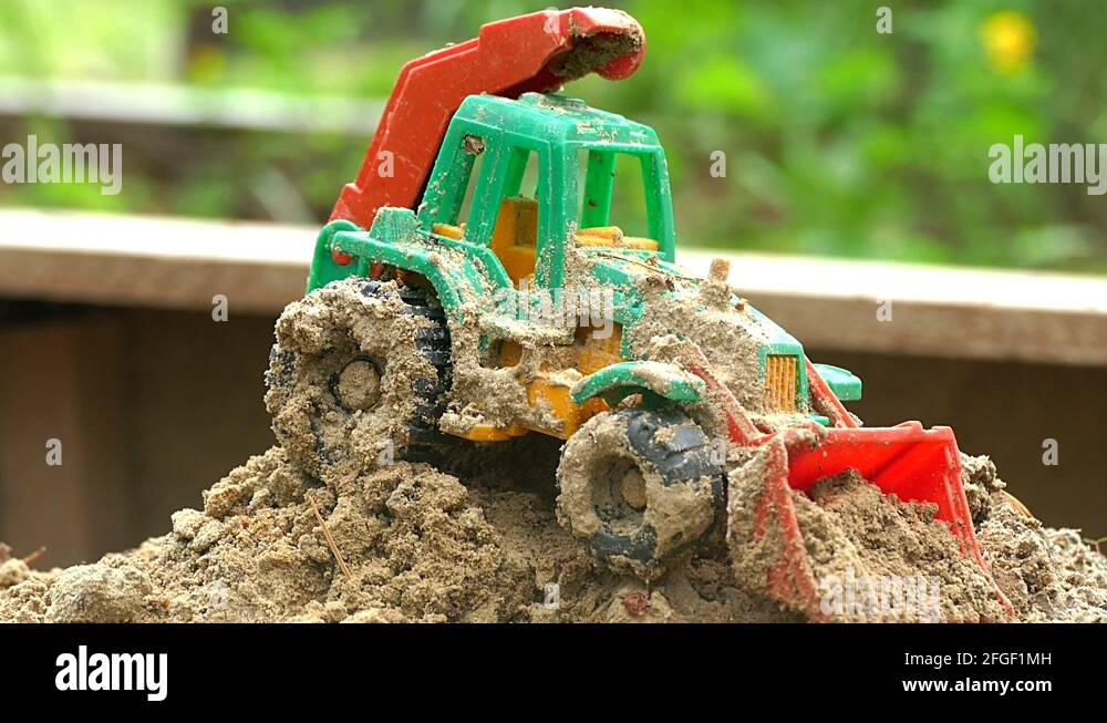 Blue toy rake Stock Videos & Footage - HD and 4K Video Clips - Alamy